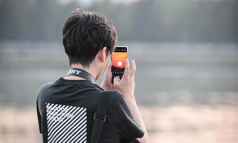 Sunset scenery at Haikou Bay in Hainan - Global Times