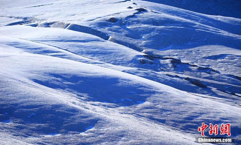 Snow turns Xinjiang grassland into picturesque wonderland - Global Times