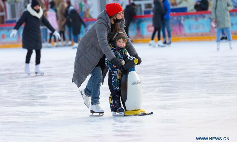 People skate on GUM ice rink at Red Square in Moscow, Russia - Global Times
