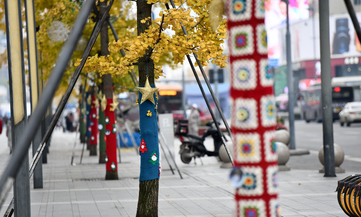 Trees wearing 'Christmas sweater' - Global Times