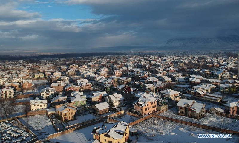 Srinagar city witnesses this winter's first snowfall - Global Times