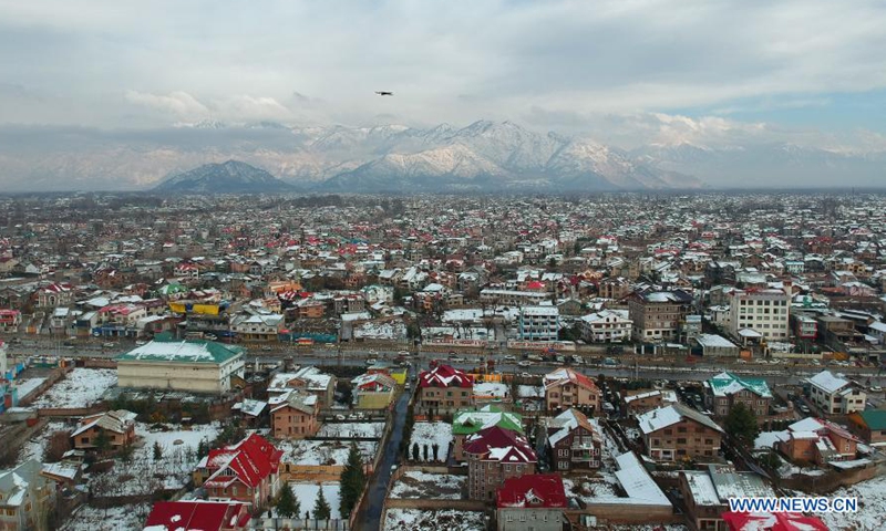 Srinagar city witnesses this winter's first snowfall - Global Times