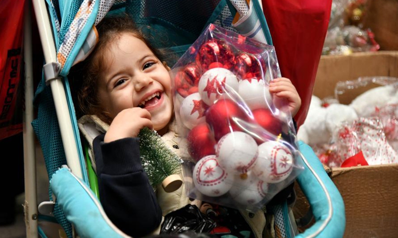 In pics: children with Christmas decorations in Syria - Global Times