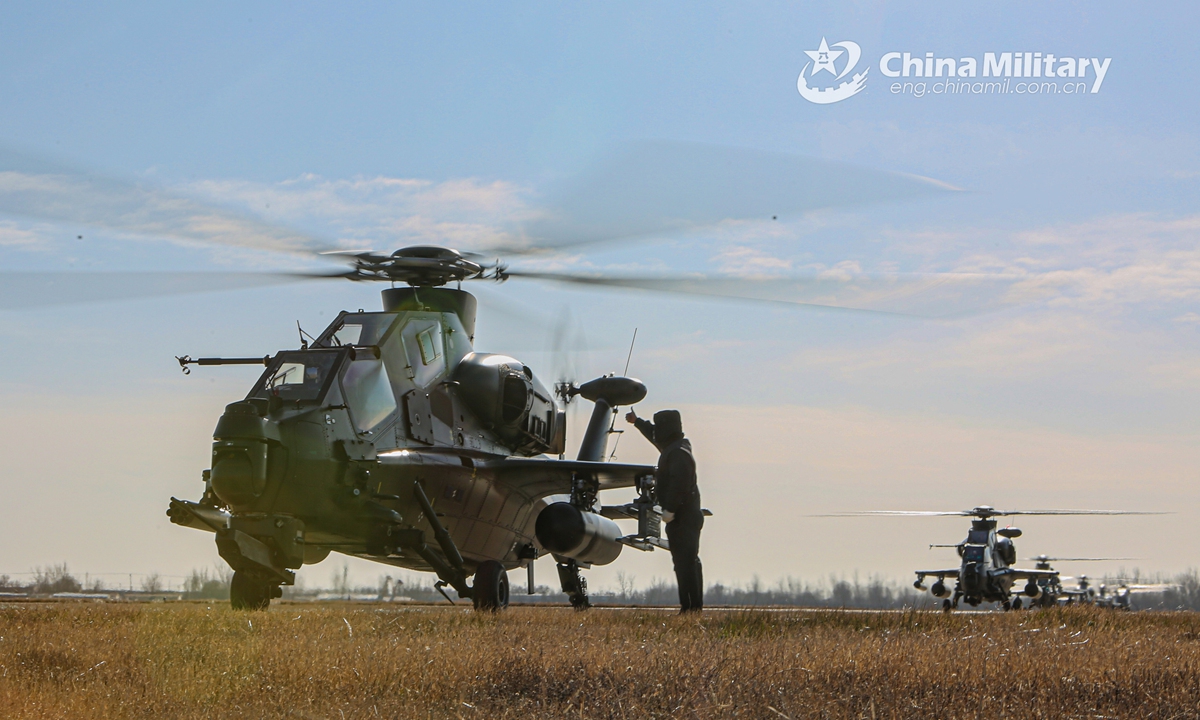 Attack helicopters in tactical formation flight training - Global Times