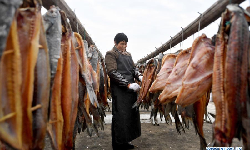 People dry fish in Linghu Township of Huzhou in E China - Global Times