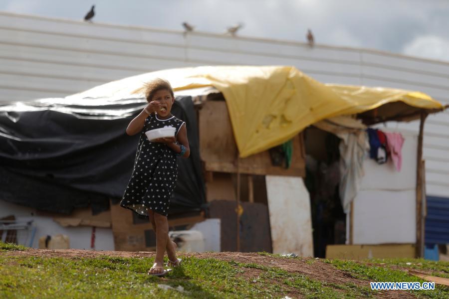 Homeless people receive lunch on Christmas in Brasilia, Brazil - Global ...