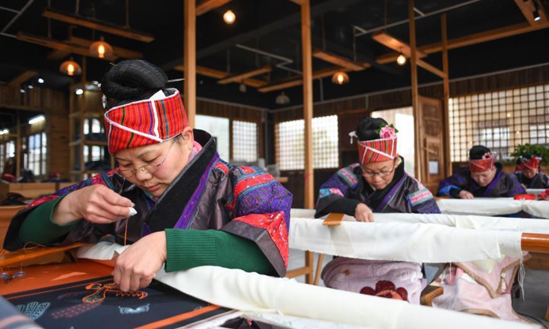 Local women make embroidery works in Shibing County, Guizhou - Global Times