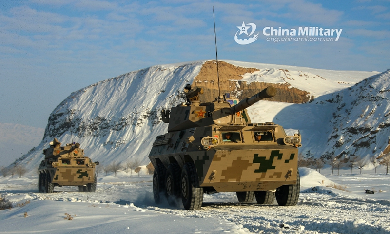 Armored vehicles conduct convoy operations - Global Times