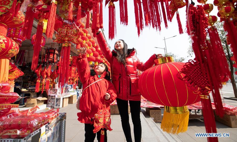 People prepare for upcoming Chinese Lunar New Year - Global Times