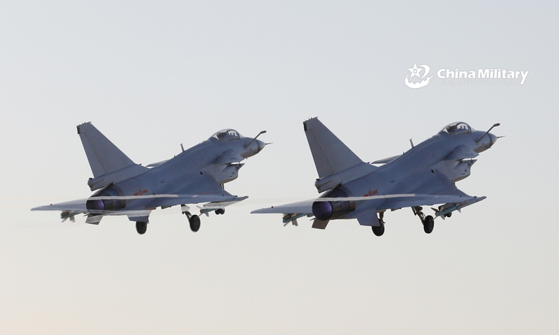 Fighter jets coordinate with each other in flight mission - Global Times