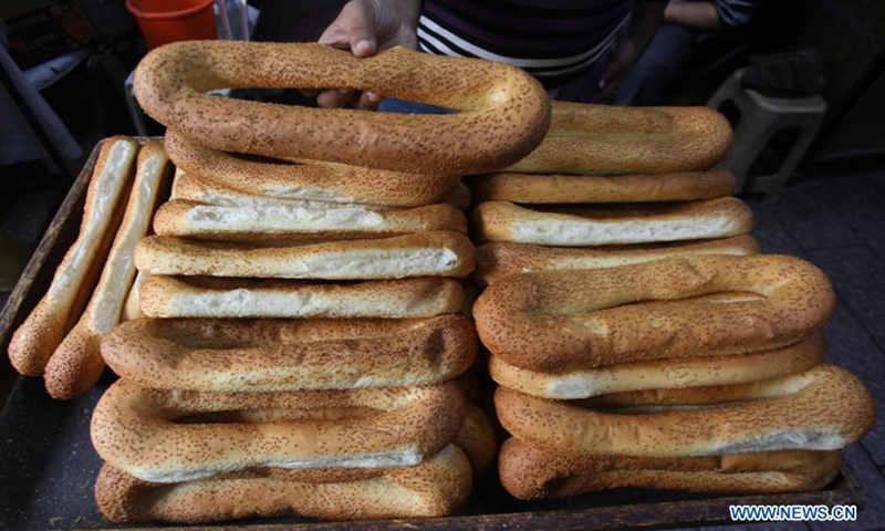 Palestinian baker works in West Bank city of Nablus - Global Times