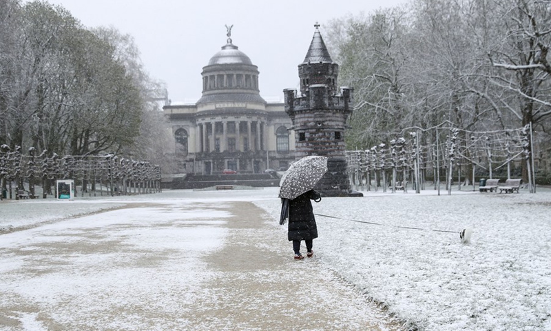 Brussels sees rare April snowfall as cold snap hits Europe - Global Times