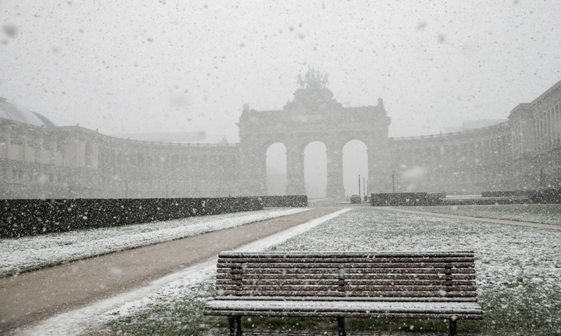 Brussels sees rare April snowfall as cold snap hits Europe - Global Times