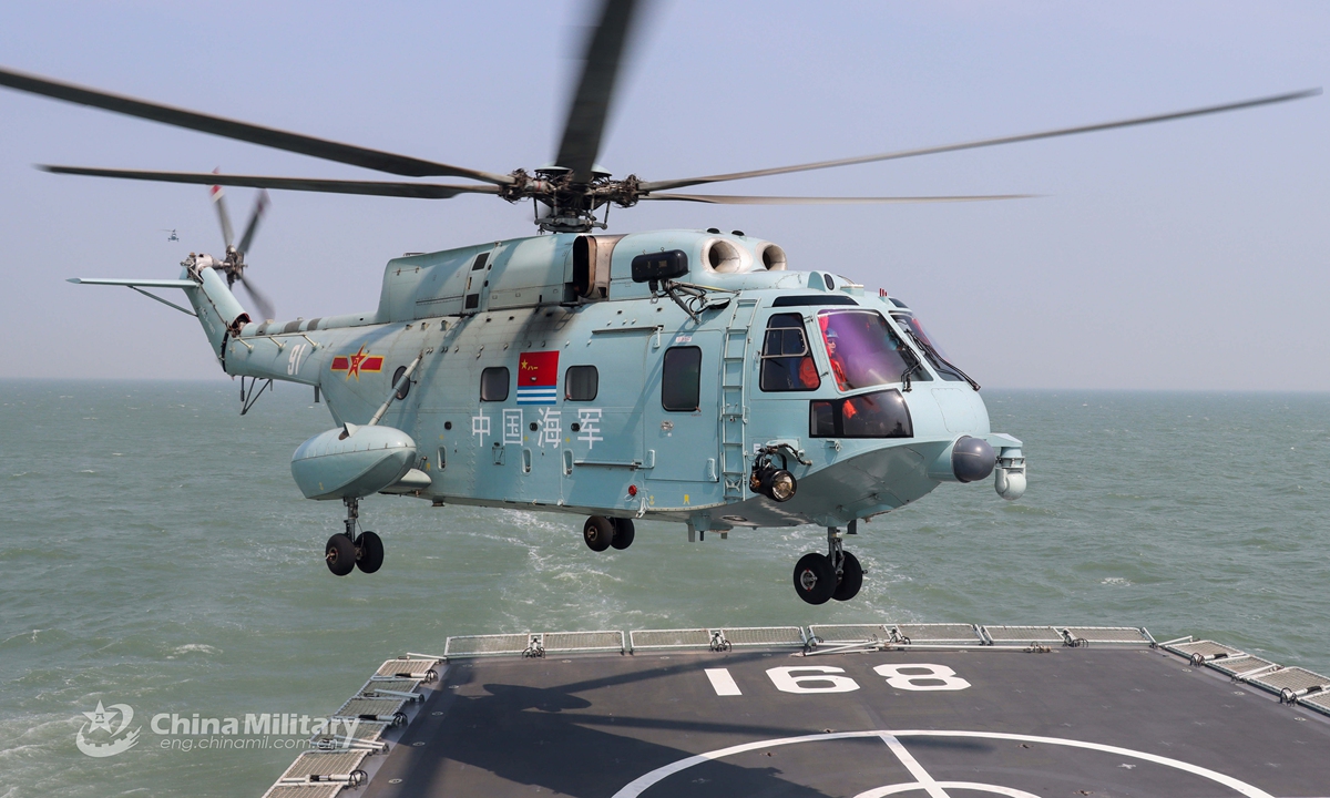 Naval ship-borne chopper lifts off flight deck - Global Times