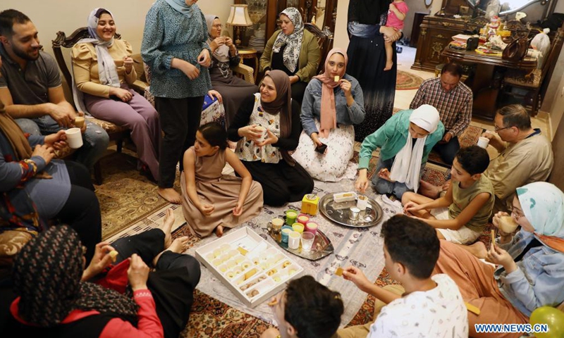 Members of Egyptian family celebrate Eid al-Fitr at home amid COVID-19 ...