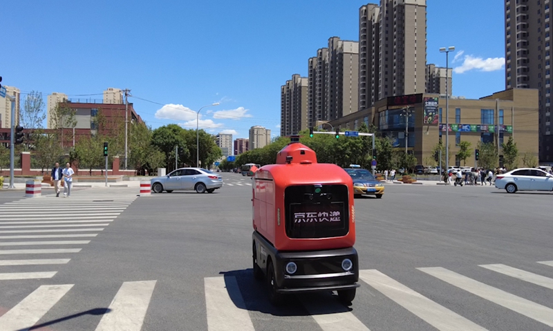 Smart China: JD self-driving delivery car - Global Times