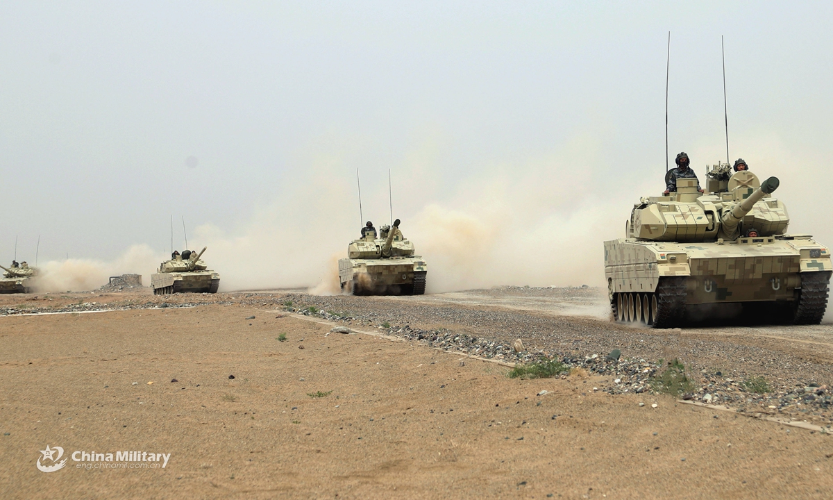 Tanks rumble in maneuver training - Global Times