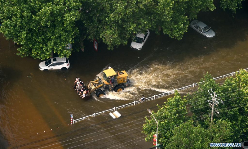 Stranded residents evacuated in flood-hit Henan - Global Times