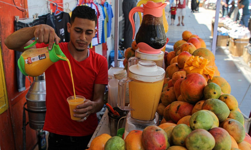 Get a taste of mango juice! - Global Times