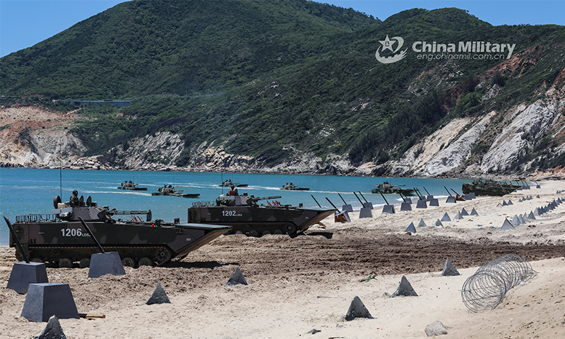Amphibious armored vehicles make ways to beach-head - Global Times