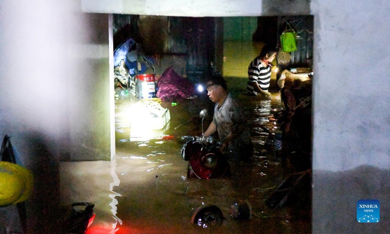 Rescuers evacuate stranded people in Nanning, S China - Global Times
