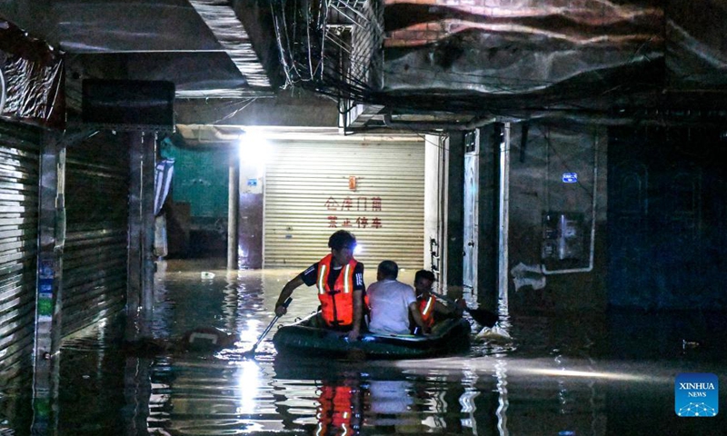 Rescuers evacuate stranded people in Nanning, S China - Global Times