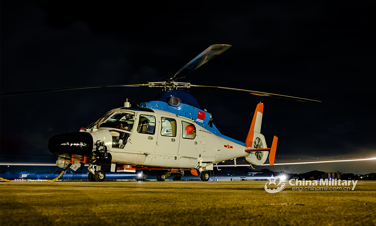 Naval helicopters conduct search and rescue training - Global Times