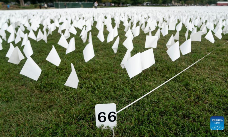 More than 600,000 white flags installed to honor lives lost to COVID-19 ...