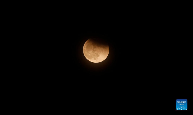 In pics: Lunar eclipse around world - Global Times