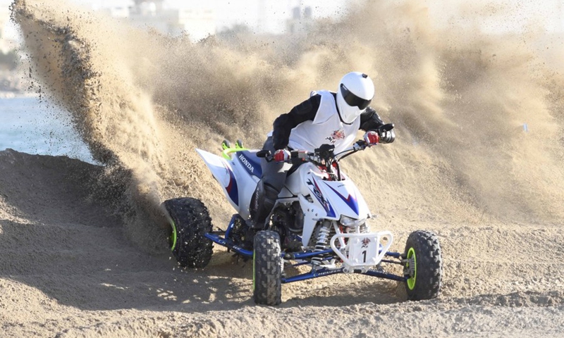 Exciting moments during land-and-sea quad bike race! - Global Times