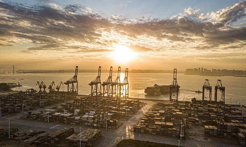 Sunrise scenery of Yangpu international container port in S China's ...