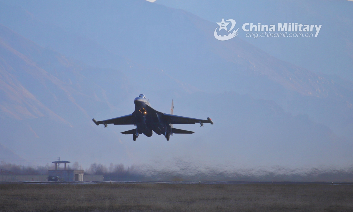 Ground crew make thorough inspect before flight - Global Times