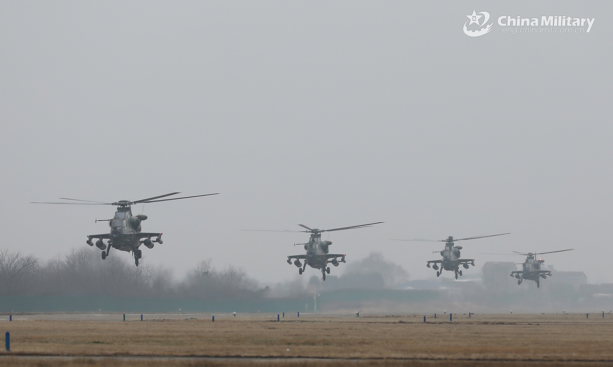 Attack helicopters hover off in flight training - Global Times