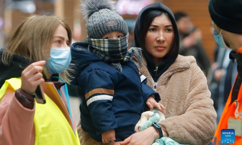 People from Ukraine arrive at railway station in Bucharest, Romania ...
