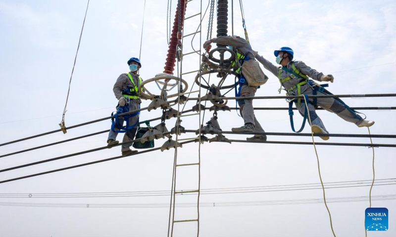 Maintenance work of power transmission project in Lujiang, east China ...