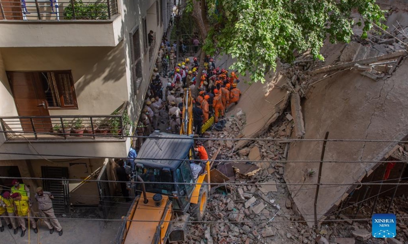 5 feared trapped after under-construction building collapses in Indian ...