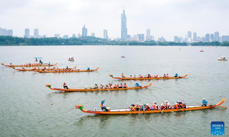 Dragon boat race held across China during holiday - Global Times