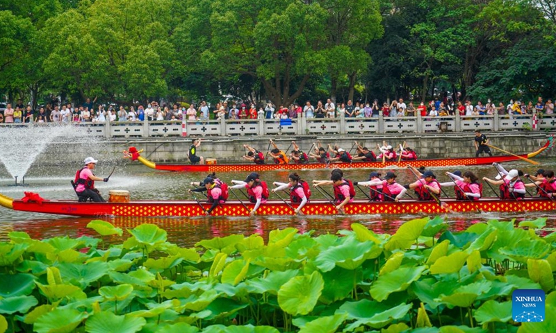Dragon boat race held across China during holiday - Global Times