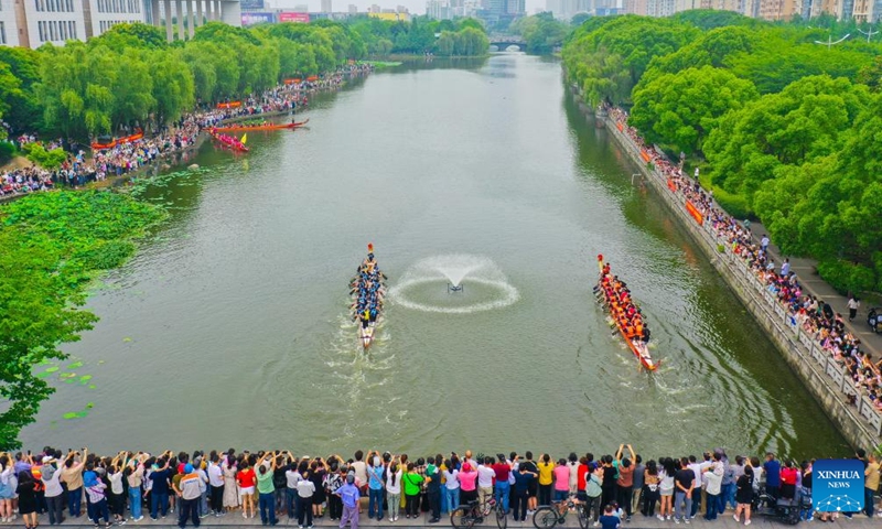 Dragon boat race held across China during holiday - Global Times