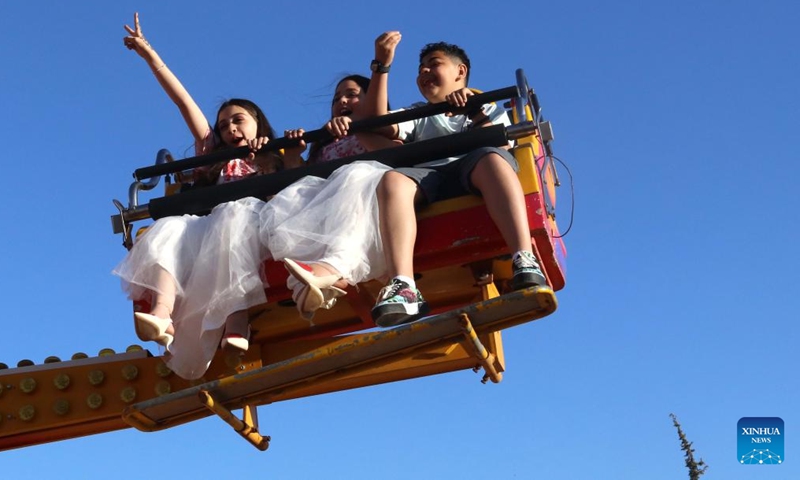 People enjoy themselves during Eid al-Adha holiday - Global Times