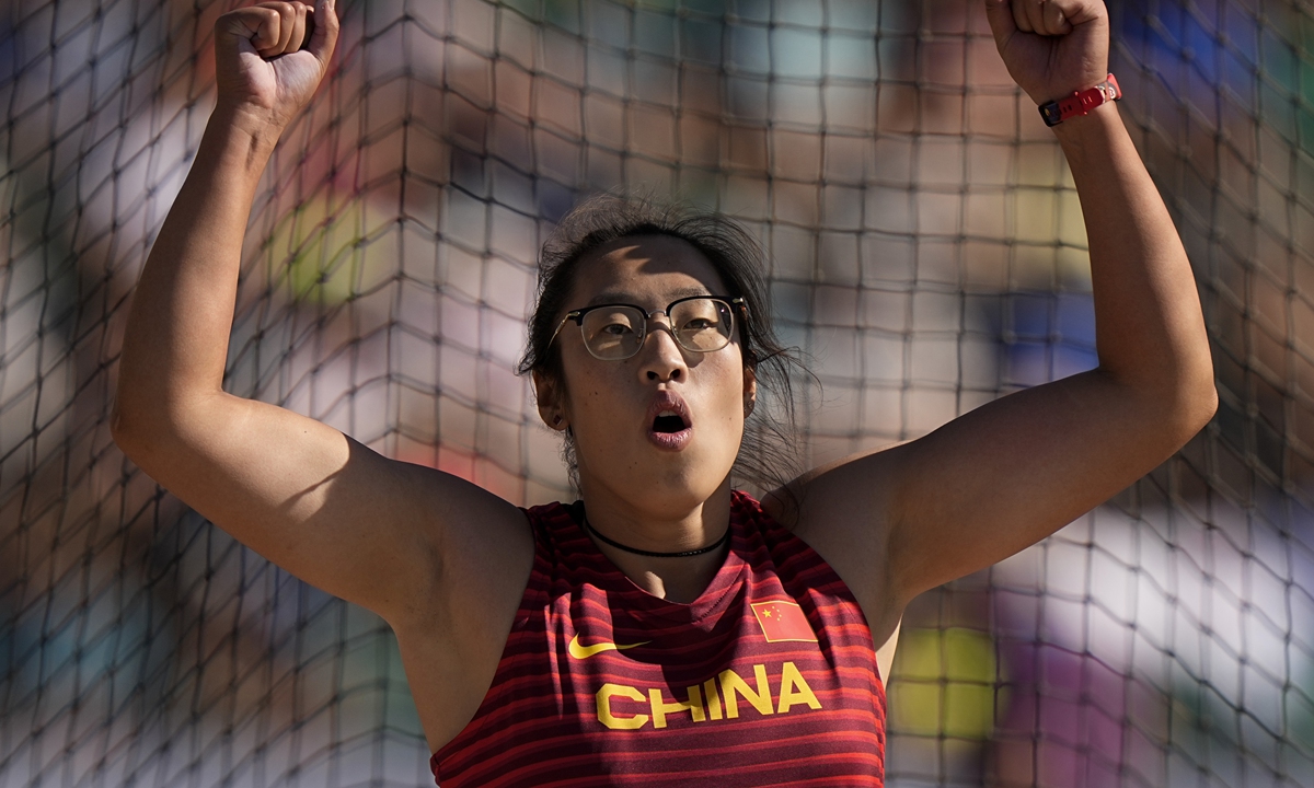 China's Feng Bin wins women's discus throw gold at World Athletics ...