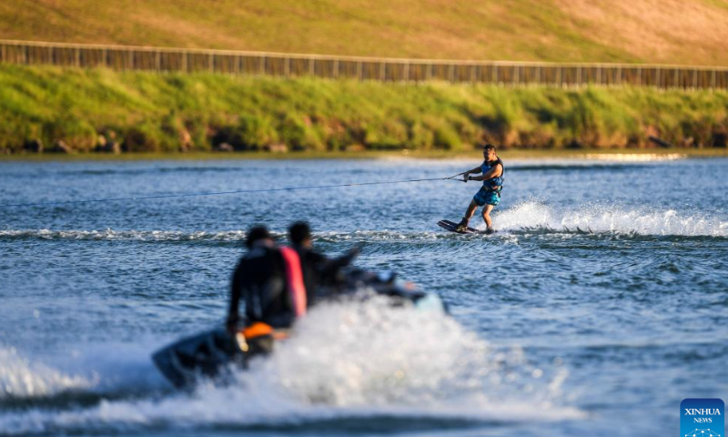 People enjoy fun and coolness of outdoor waters during summer days in ...