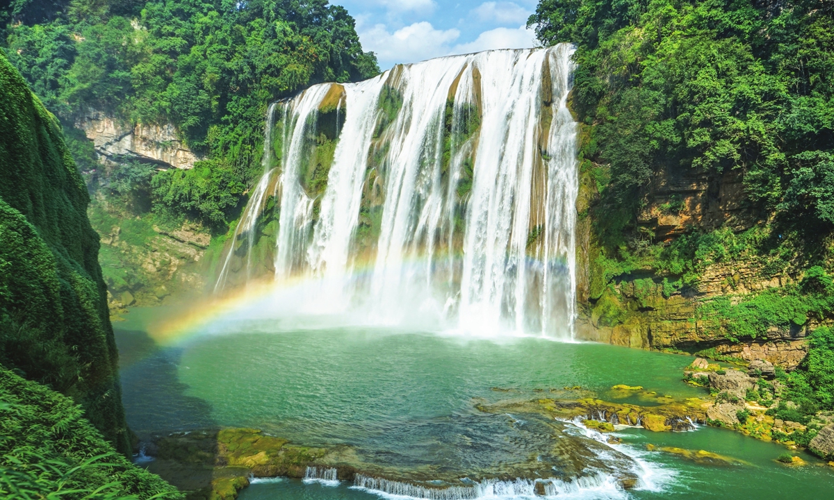 Rainbow framed with waterfall - Global Times