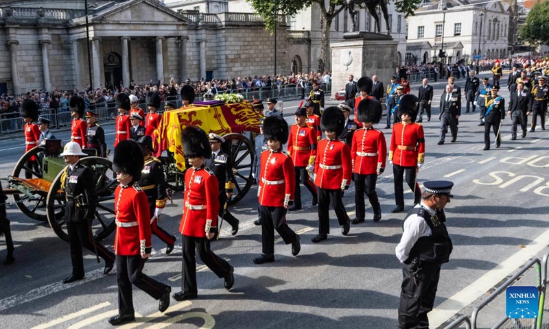 Procession of Queen Elizabeth II's coffin for lying-in-state in London, Britain - Global Times