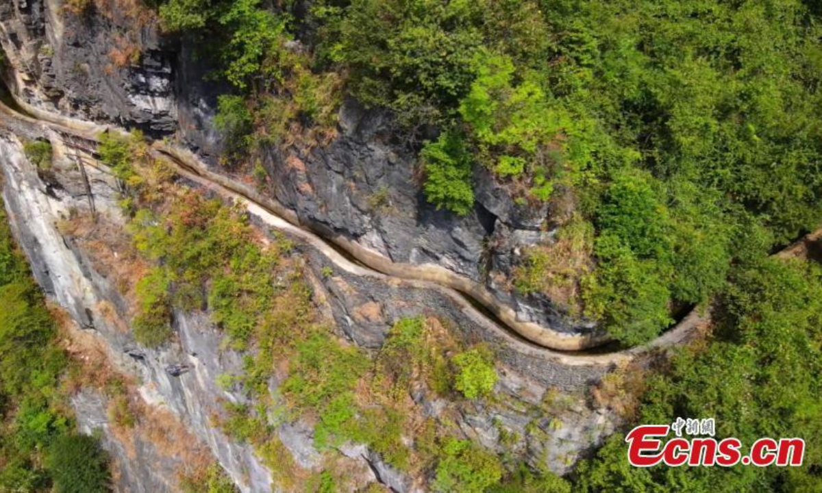 Canal constructed along cliff benefits locals for 40 years - Global Times