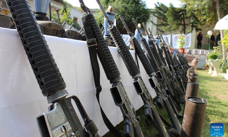 Hundreds of weapons collected as Afghans voluntarily hand in arms ...