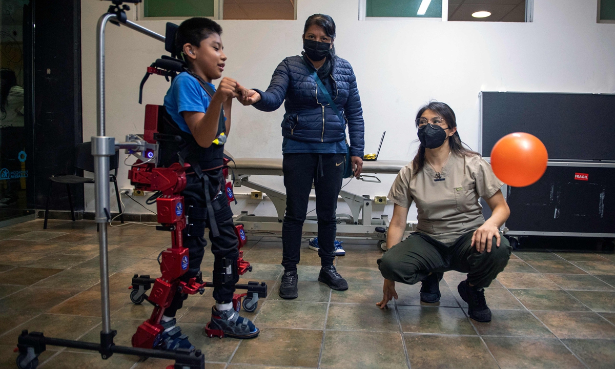 Robotic exoskeleton gives paralyzed children gift of walking - Global Times