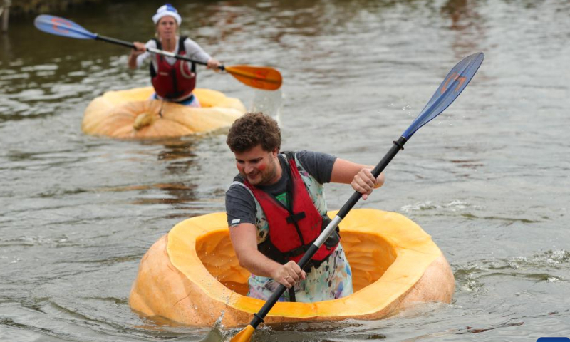 People compete in pumpkin regatta in Belgium - Global Times