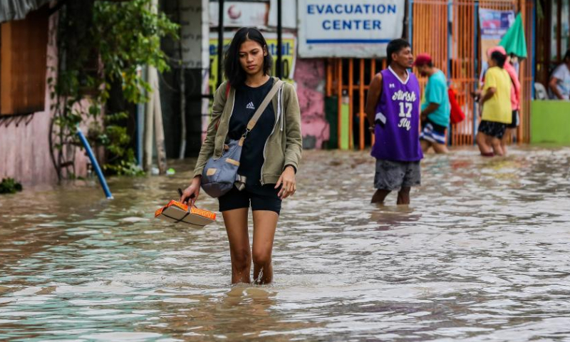 Philippine authorities revise tropical storm Nalgae death toll to 45 ...