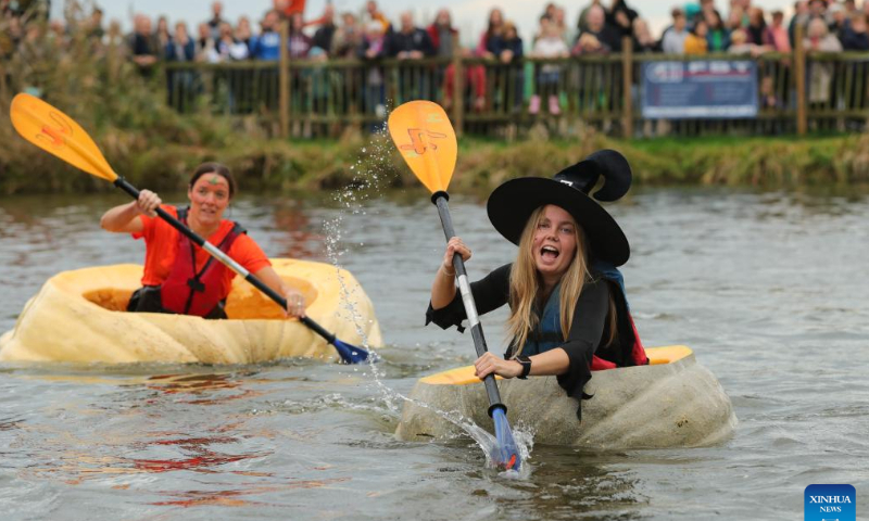 People compete in pumpkin regatta in Belgium - Global Times